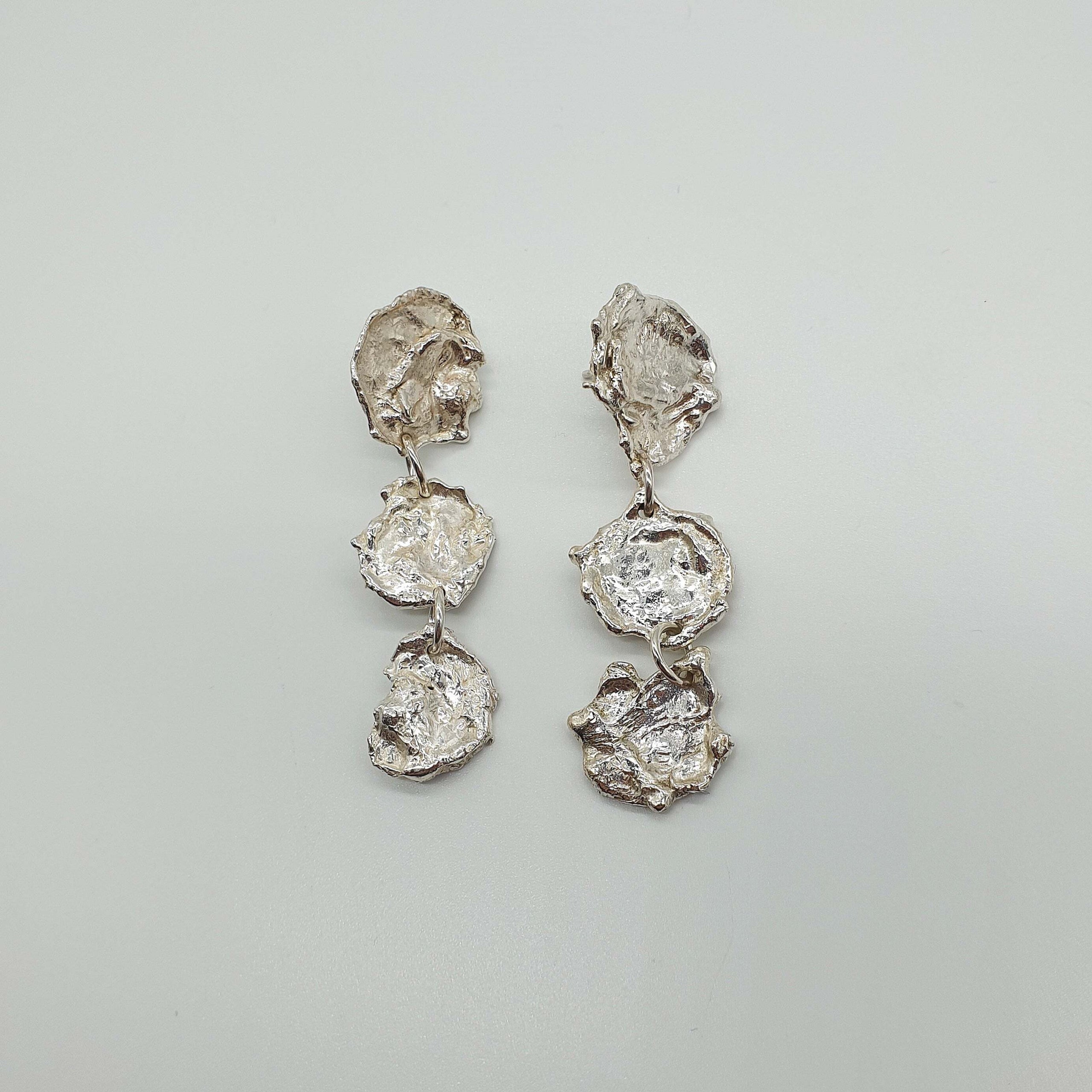 Gabbee Stolp: River-Water Triple Droplet Earrings | Design Tasmania